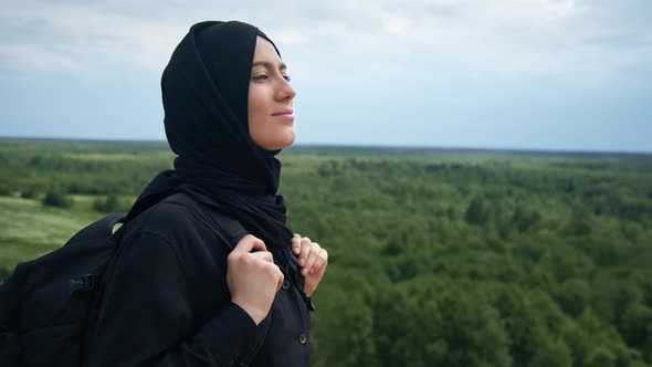 Smiling Muslim Backpacker Female Admiring Nature Landscape From Top of ...