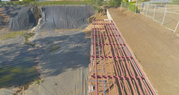 drone shot, cement slab construction, cement mixer truck, cement ramp ...