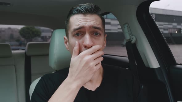 Sad Desperate Man Crying While Sitting in the Car. Shocked Man Crying ...