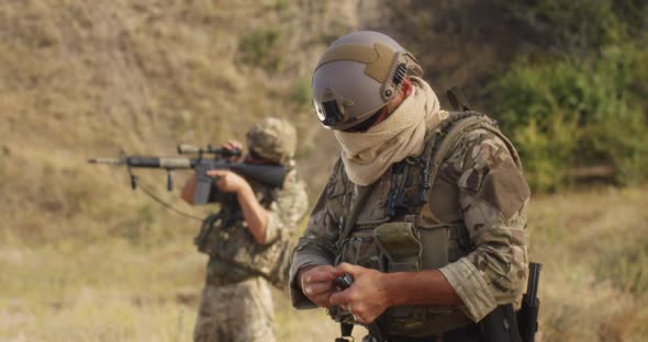 Unrecognizable Soldier Reloading Rifle During War, Stock Footage ...