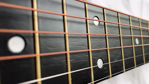 Zoom in Shot of Black Frets Fretboard Acoustic Guitar String, Stock Footage