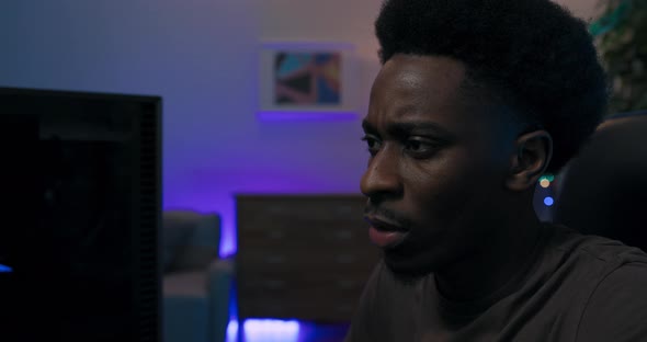 Close Up Shot of Young Man's Face Professional Gamer Sits Comfortably ...