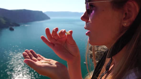 Woman Eating Milky Almond Nuts, Stock Footage | VideoHive