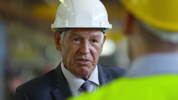 Factory boss talking to worker, Stock Footage | VideoHive