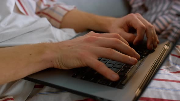 Freelancer Hands Typing Laptop Keyboard in Pajamas Closeup, Stock Footage