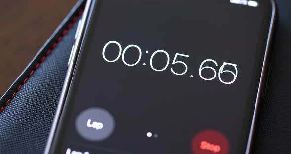 Numerical digital stopwatch with white number and black screen on ...