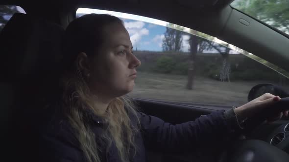 Upset Sad Thoughtful Girl Driving a Car, Stock Footage | VideoHive