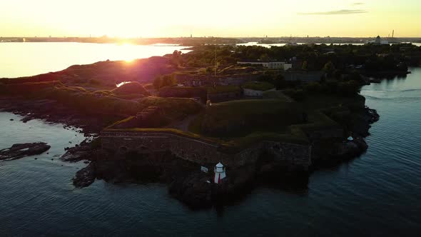View of lighthouse and fortified wall in sea, Stock Footage | VideoHive