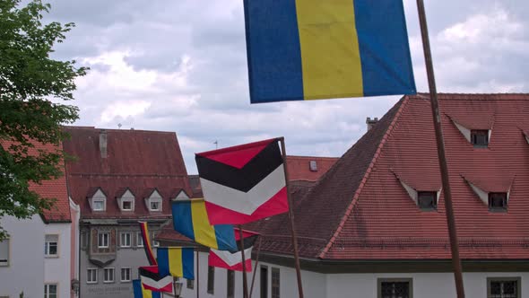 Multicolored Flags on the Streets of Fussen., Stock Footage | VideoHive