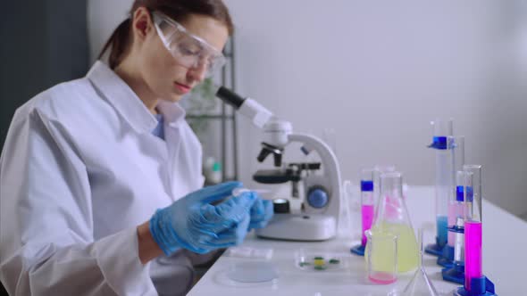 Laboratorian is Testing Samples in Medical Laboratory, Stock Footage