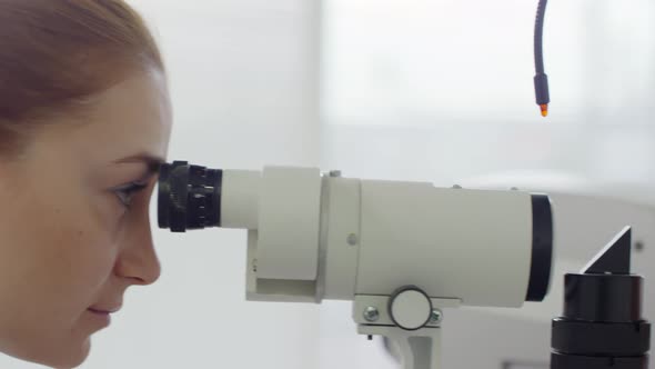 Optometrist Using Slit Lamp during Eye Exam, Stock Footage | VideoHive