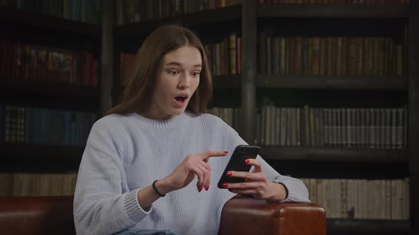 Close Up Caucasian Woman Browsing on Smart Phone Online Getting Excited ...