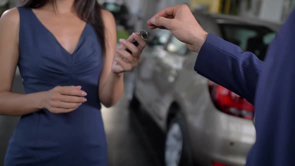 Handing Over Car Keys at Automobile Dealership, Stock Footage | VideoHive