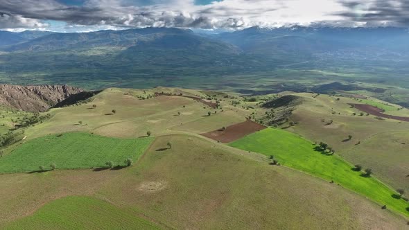 Long Plain Topography Surrounded By Hills, Stock Footage | VideoHive