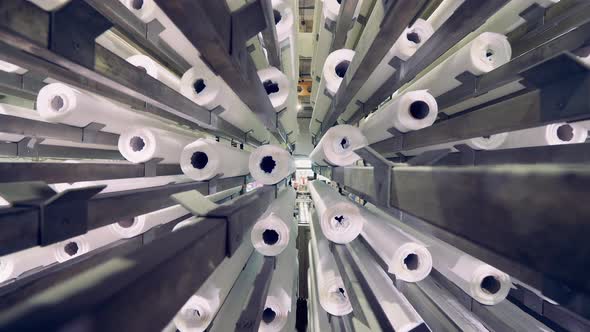 Inside View of a Metal Machine Transporting Paper Rolls, Stock Footage