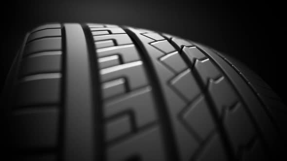 Endless slow-motion animation of a car tire spinning around. Loopable ...