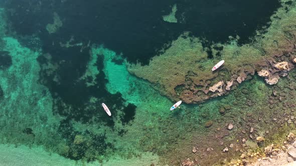 Sup surfing group aerial view 4 K Turkey Alanya, Stock Footage | VideoHive