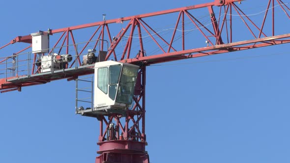 Tower crane cabin close-up working on a construction site, Stock Footage