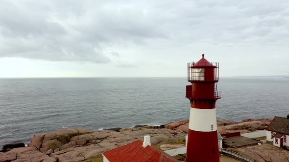 Aerial approaching top lantern tower of Ryvingen lighthouse with north ...