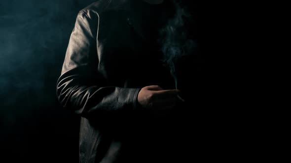 Anonymous Man Smoking In The Dark, Stock Footage | VideoHive