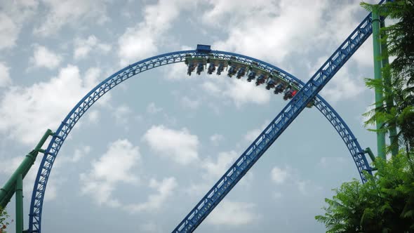 Rollercoaster train moving along loop, Stock Footage | VideoHive