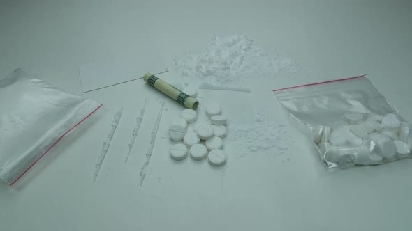 Cocaine Strips And Narcotic Tablets On The Table Are Ready For Use ...