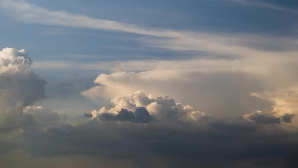 Time lapse footage of fast moving dark clouds forming on stormy sky ...