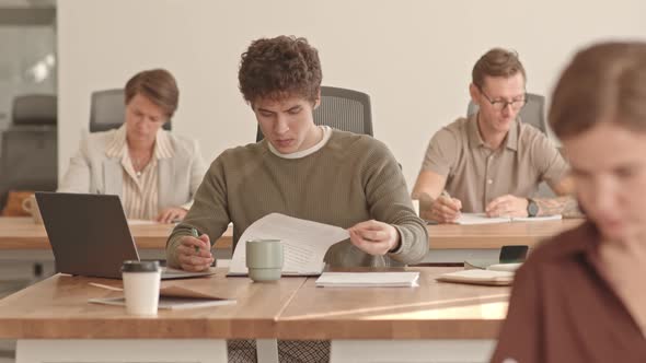 Office Workers Doing Paperwork, Stock Footage | VideoHive