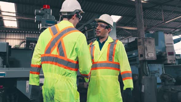 Factory Workers Handshake with Team Member in the Factory, Stock Footage