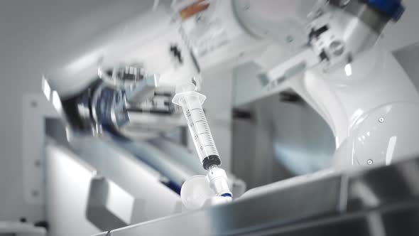 The Innovative Arms of a Robotic Arm Make an Injection of Chemotherapy ...