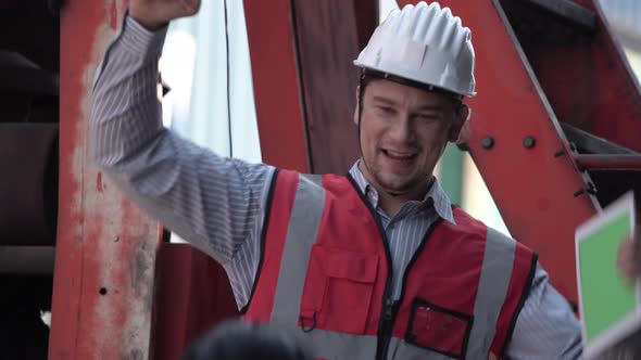 Happy group of worker and engineer celebrating in a shipyard, Funny ...
