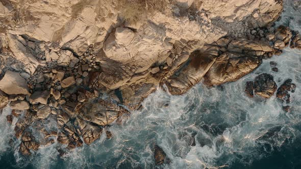 Aerial Top Down View of Rocky Coastline, Stock Footage | VideoHive