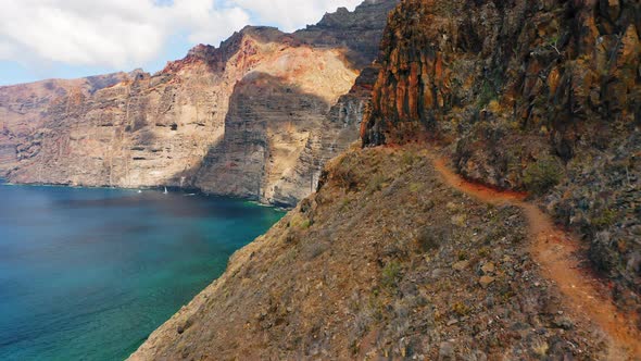 Narrow Dangerous Path Along Volcanic Rocks, Stock Footage | VideoHive