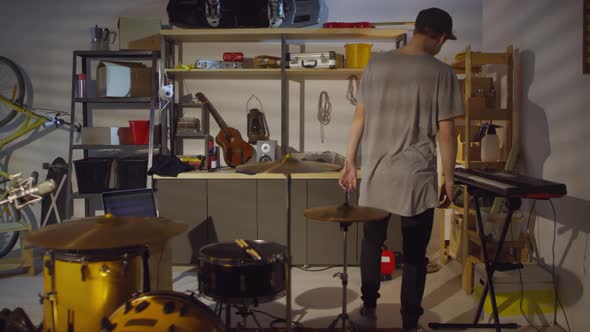 Young Man Drinking Beer In Garage, Stock Footage | VideoHive