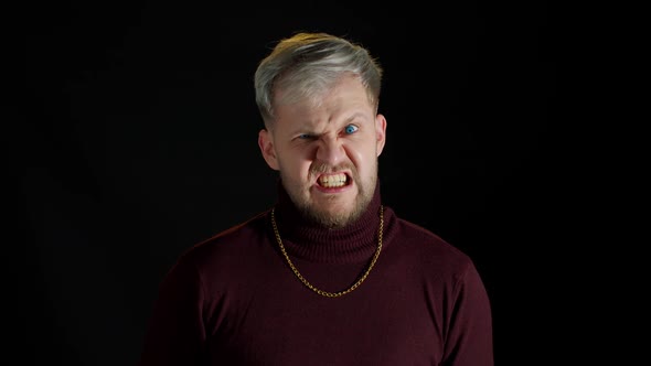 Disappointed Handsome Man with Blue Eyes Showing Negative and Agressive ...