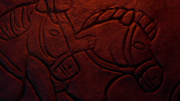 Horses Old Rock Carving In Firelight With Dust, Stock Footage | VideoHive
