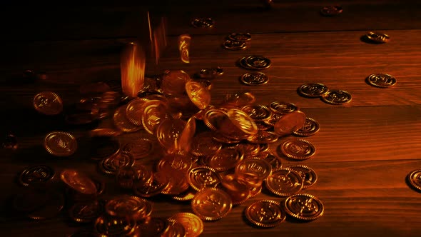 Coins Fall On Table In Fire Light, Stock Footage | VideoHive