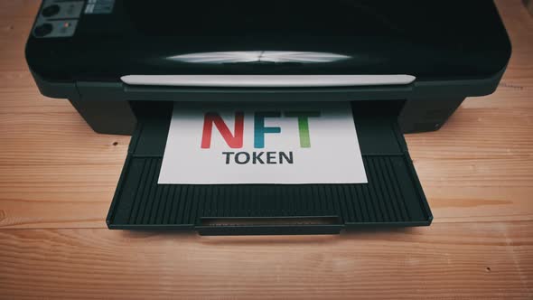 NFT Token Printing Inscription on White Sheet of Paper Printed By a Jet ...