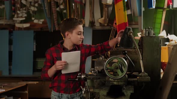 Boy Learning to Work on a Locksmith Machine, Stock Footage | VideoHive