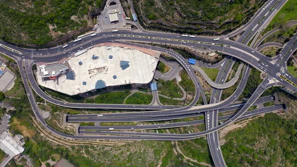 Massive multi level highway interchange with traffic on all routes ...