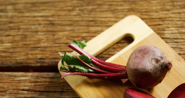 Raw beetroot on chopping board 4k, Stock Footage | VideoHive