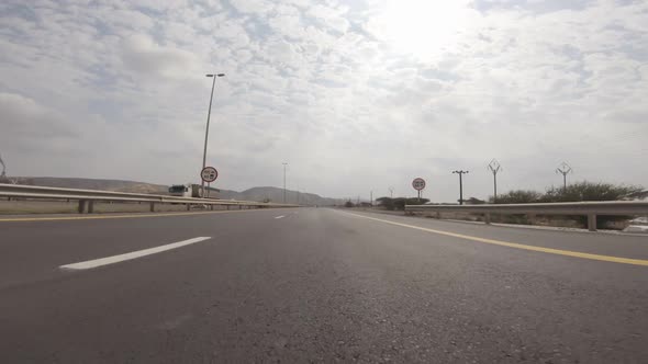 Middle Eastern Road Trip Firstperson View in a Moving Car on a Deserted ...