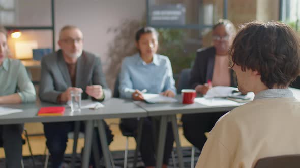 Recruitment Committee Interviewing Candidate in Office, Stock Footage