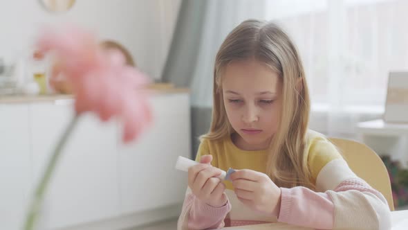 Girl Using Glue Stick, Stock Footage | VideoHive