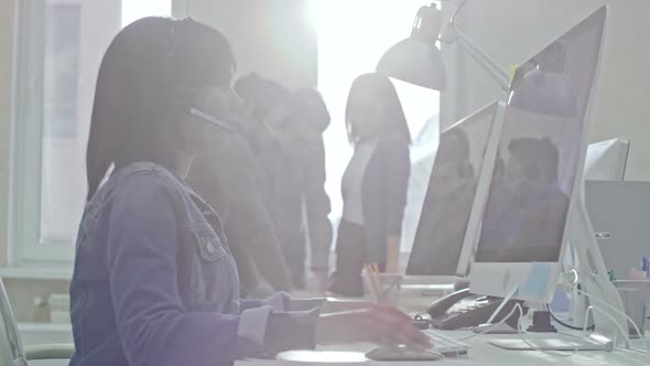 Young Woman Making Cold Calls in Office, Stock Footage | VideoHive