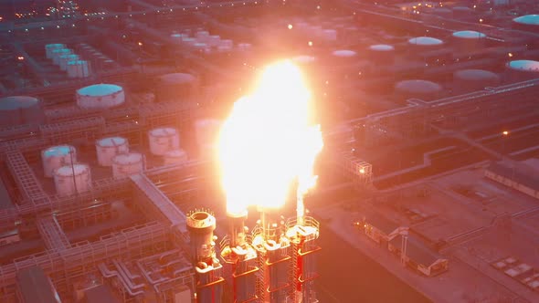 Flashes of Fire are Going Out of the Oil Refinery Pipes, Stock Footage