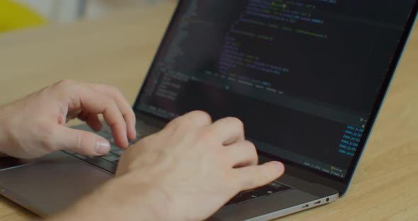 Close Up Man Coding Html and Programming on Screen Monitors ...