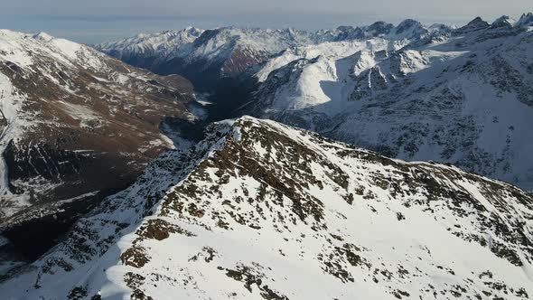 Aerial View of Cheget Mountain Range in Snow in Winter in Sunny Clear ...