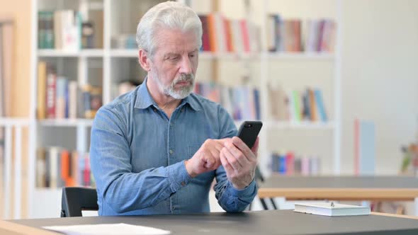 Old Man Using Smartphone, Stock Footage | VideoHive