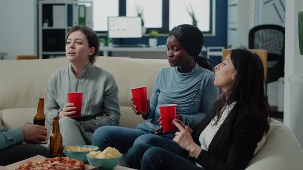 Cheerful Coworkers Cheers with Cups and Bottles of Beer, Stock Footage